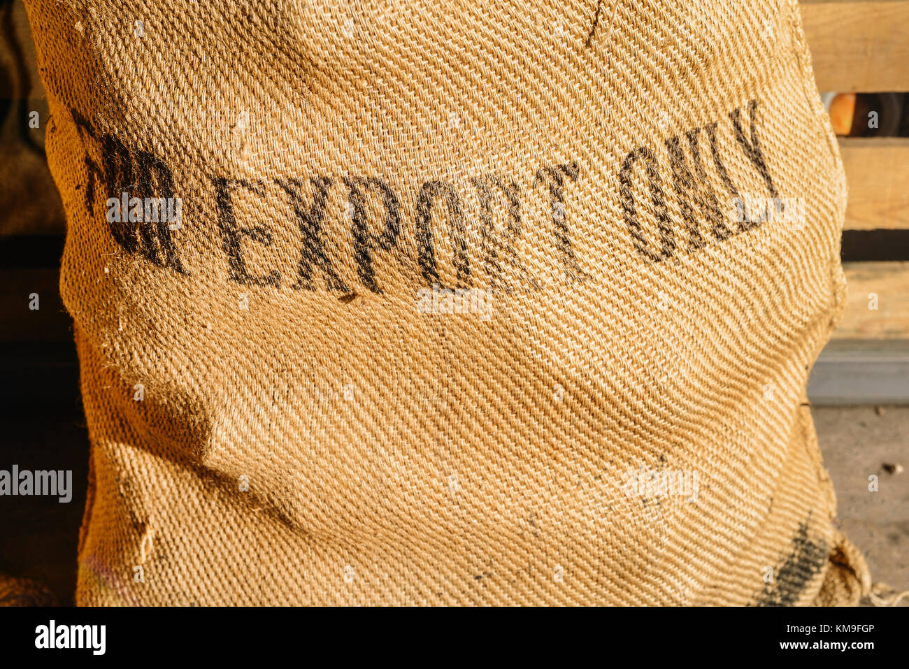 Rustic coffee bean bag with "For Export Only" written on front ...