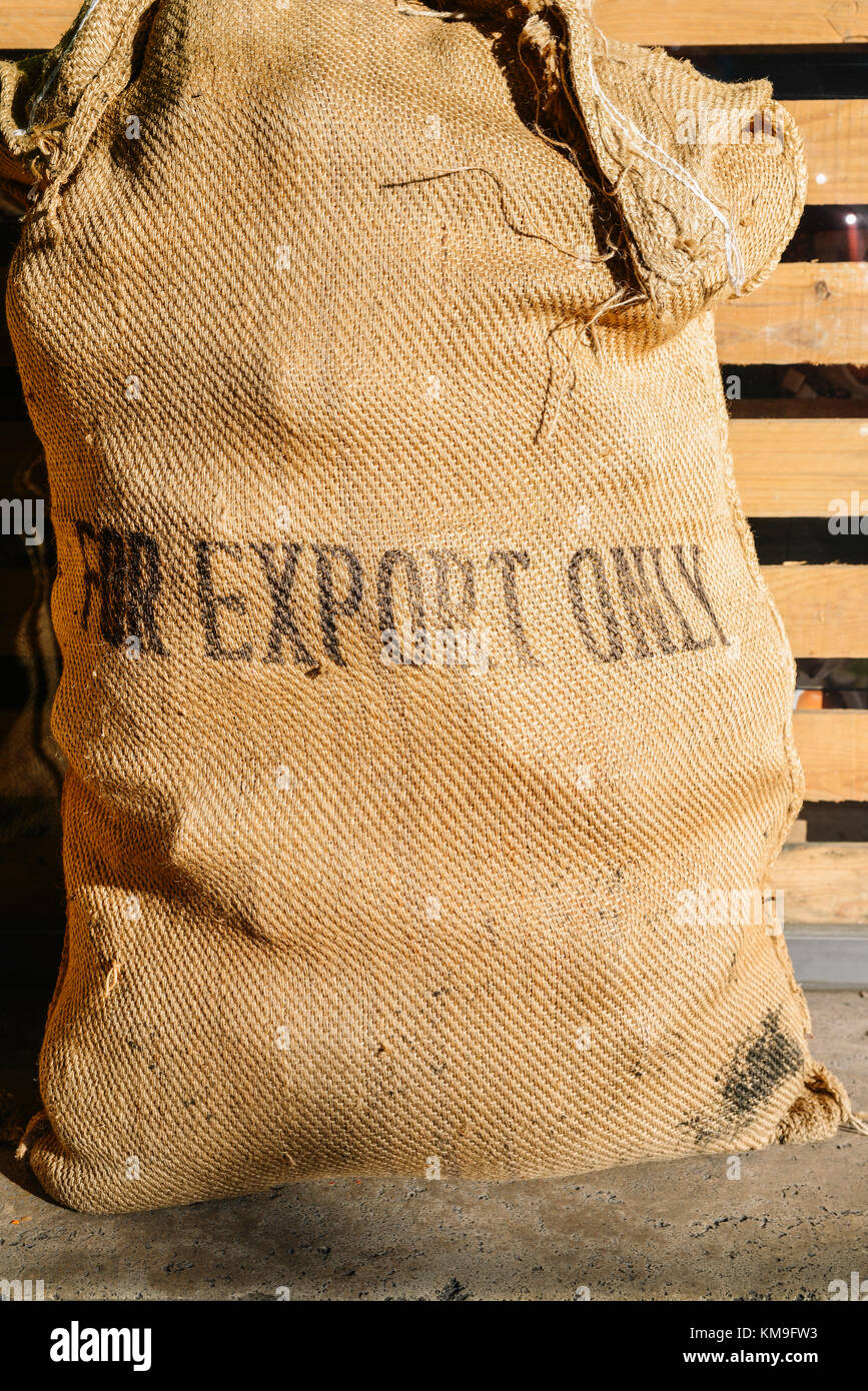 Rustic coffee bean bag with "For Export Only" written on front ...