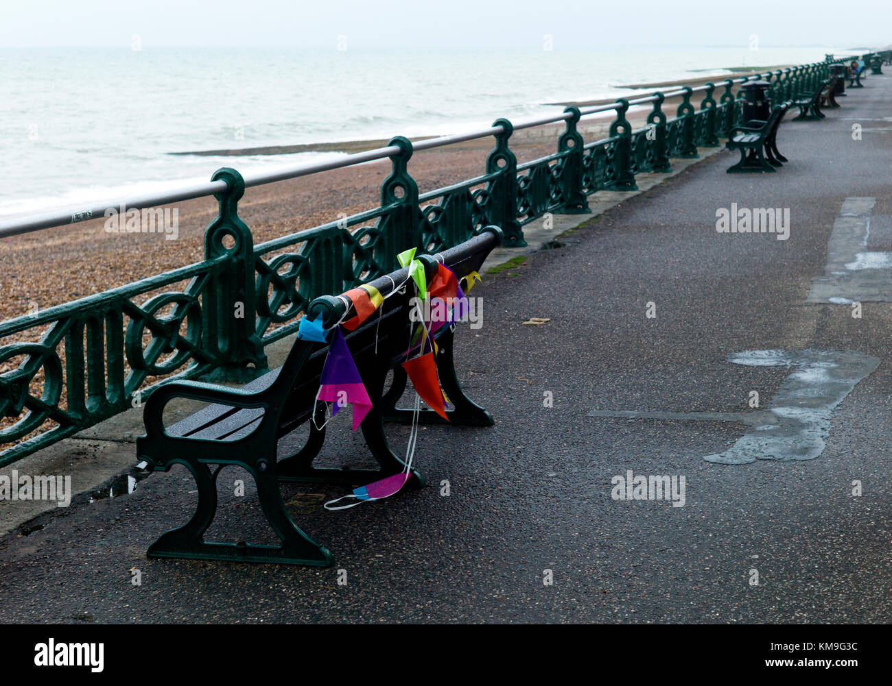 Empty bench draped in bunting Stock Photo - Alamy
