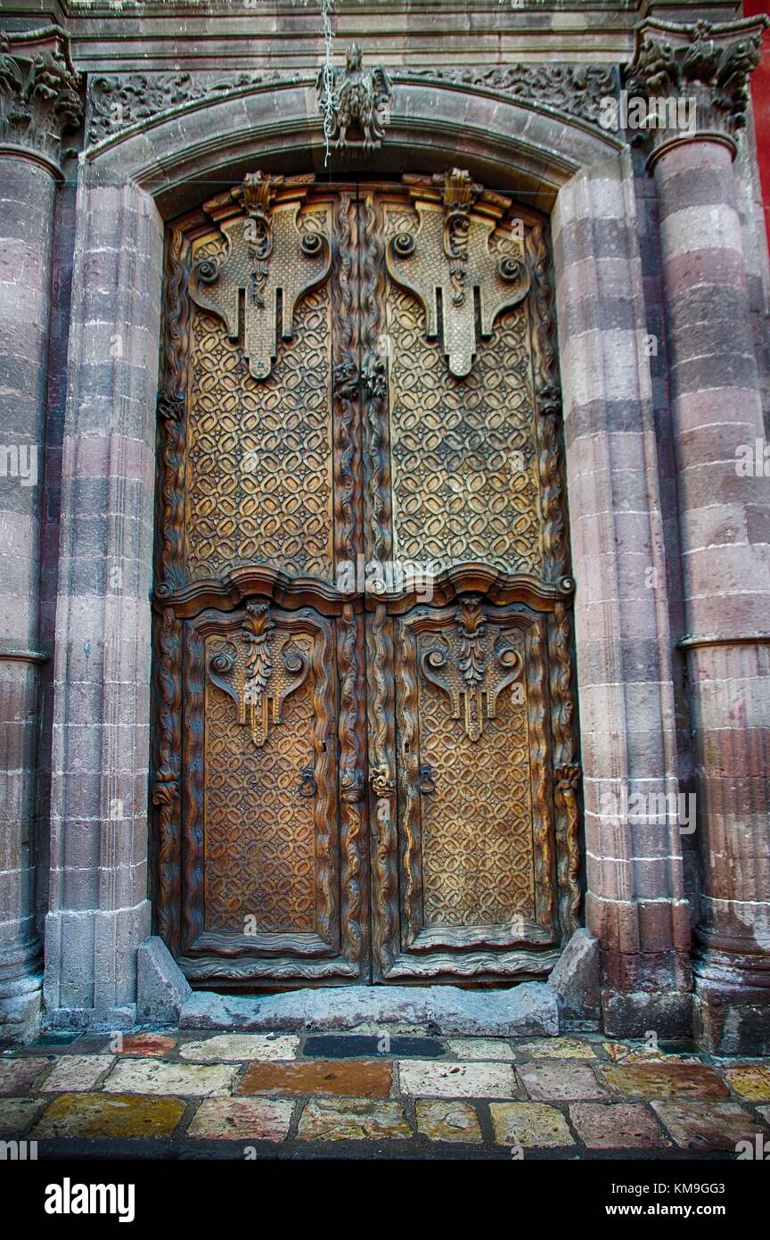 Carved wooden door catholic church hi-res stock photography and images ...
