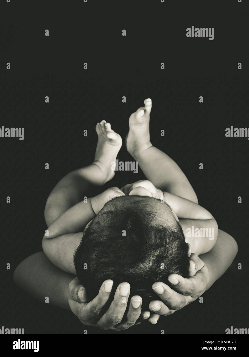 Baby on hand Stock Photo - Alamy