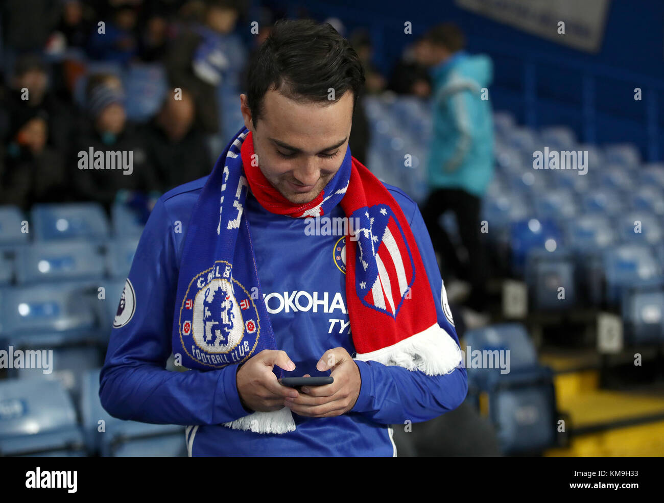 A Chelsea fan with a half-and-half scarf before the UEFA Champions ...