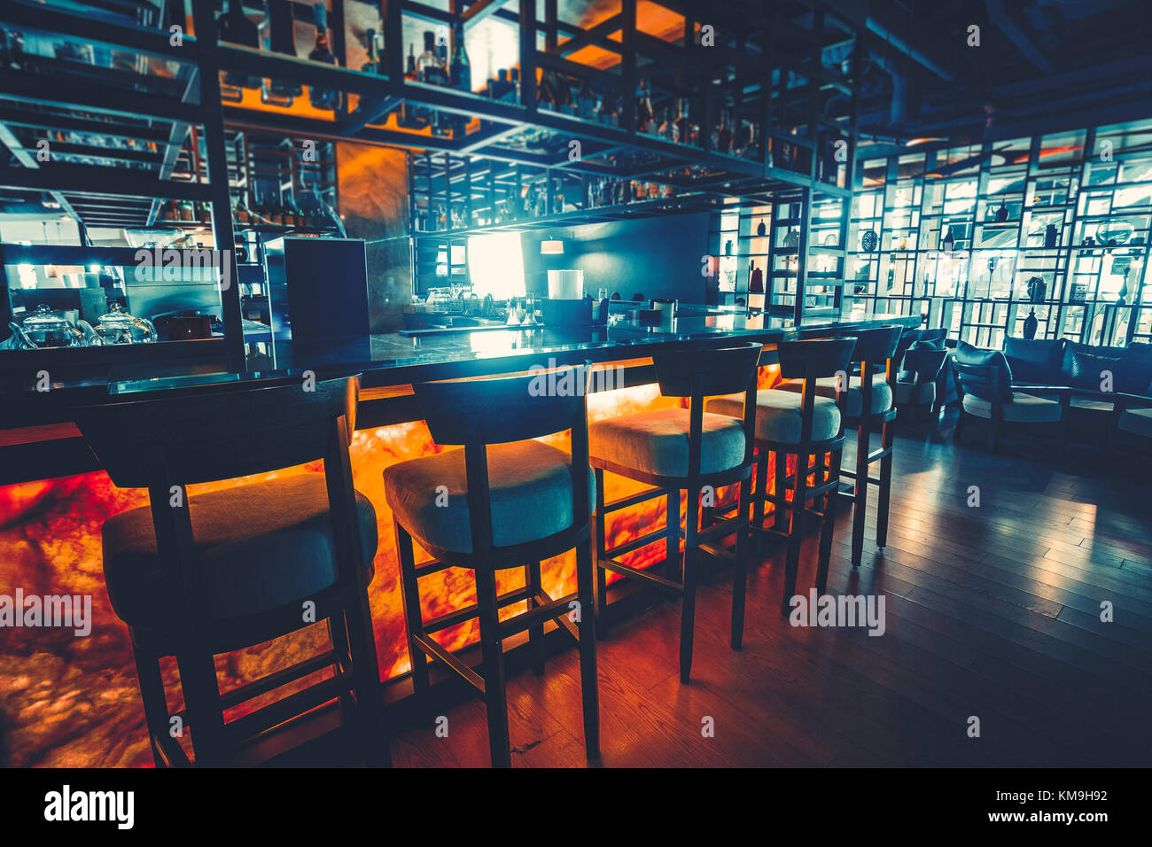 Bar counter in the dark night background Stock Photo - Alamy