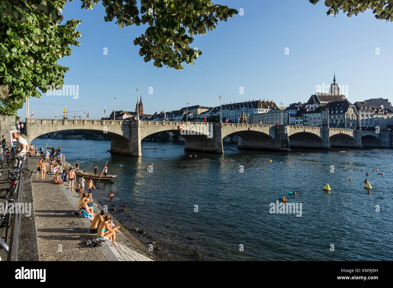 Rhine River , People sunbathing , Basel, Switzerland Stock Photo - Alamy