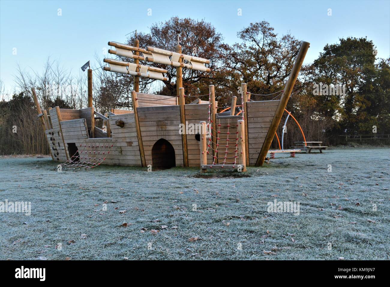 Playground pirate ship large wooden play ship on a frosty bright Autumn ...