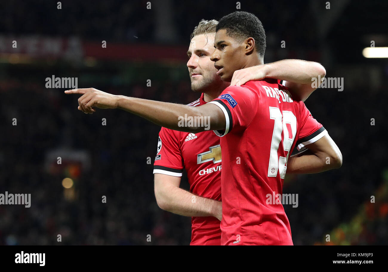 Manchester United's Marcus Rashford (right) celebrates scoring his side ...