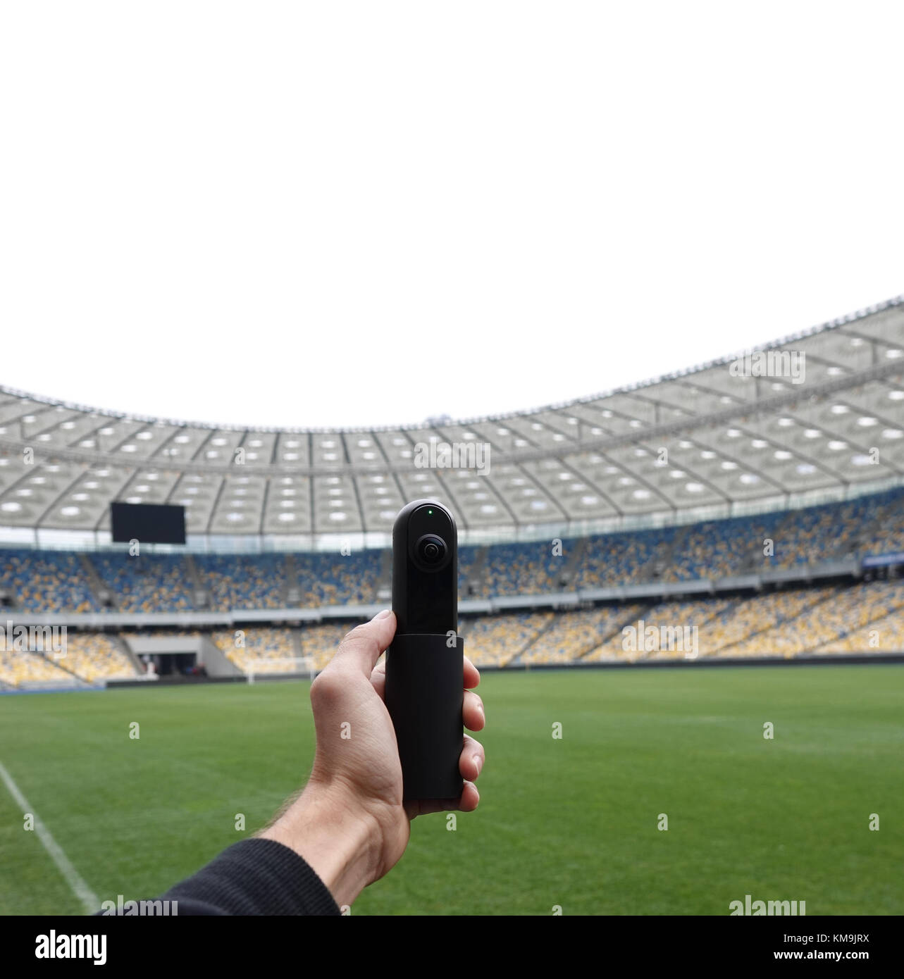 Camera 360 degrees in the male hand in the process of shooting. Live ...