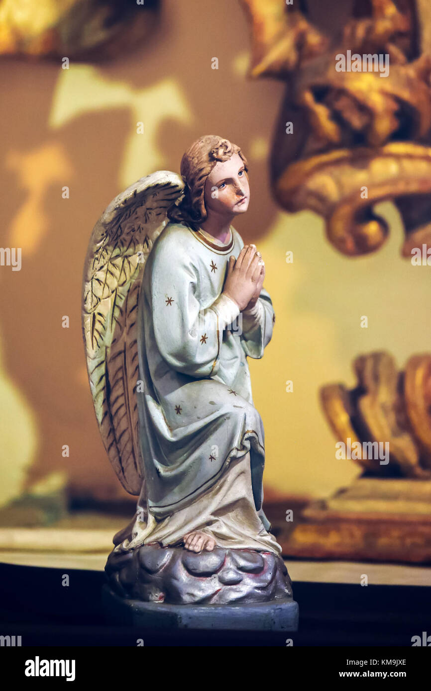 Statue of a Praying Angel in Loreta church, Prague Stock Photo - Alamy