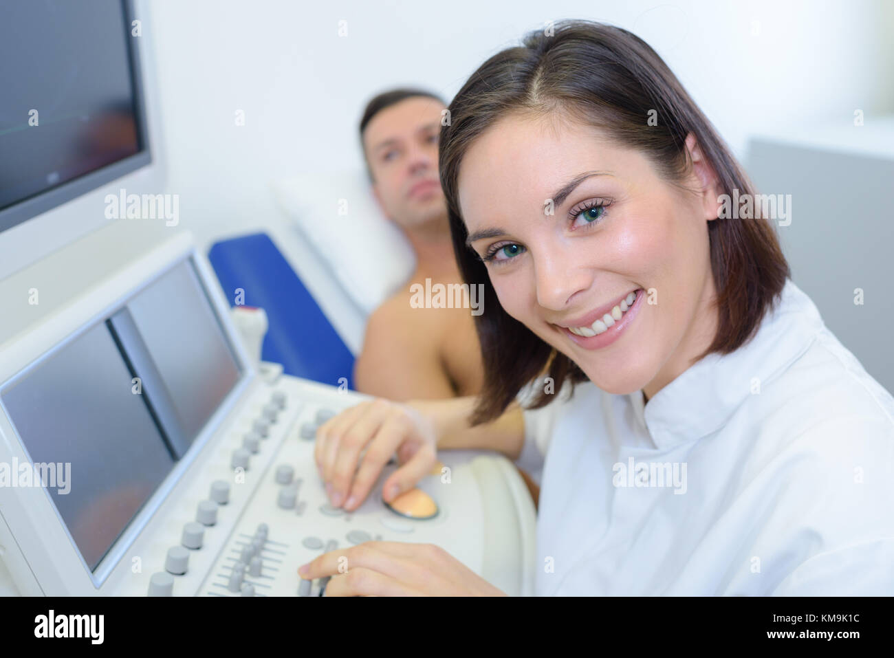 Portrait of nurse at ultrasound machine Stock Photo - Alamy
