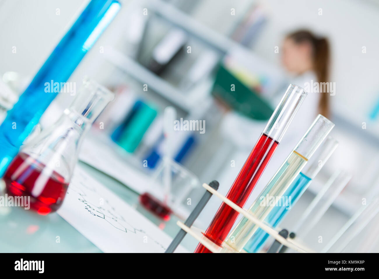 test tubes in rack on laboratory background Stock Photo - Alamy