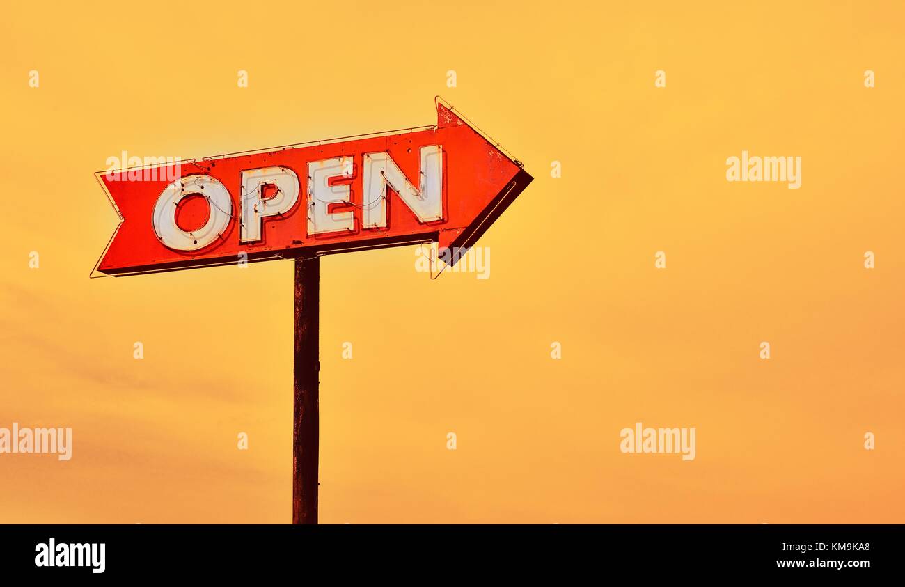 Open neon old sign in route 66 at sunset Stock Photo - Alamy