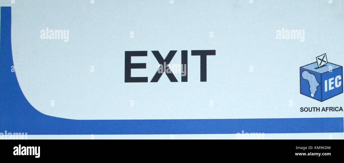 Sign showing the exit at a voting station for the National and ...
