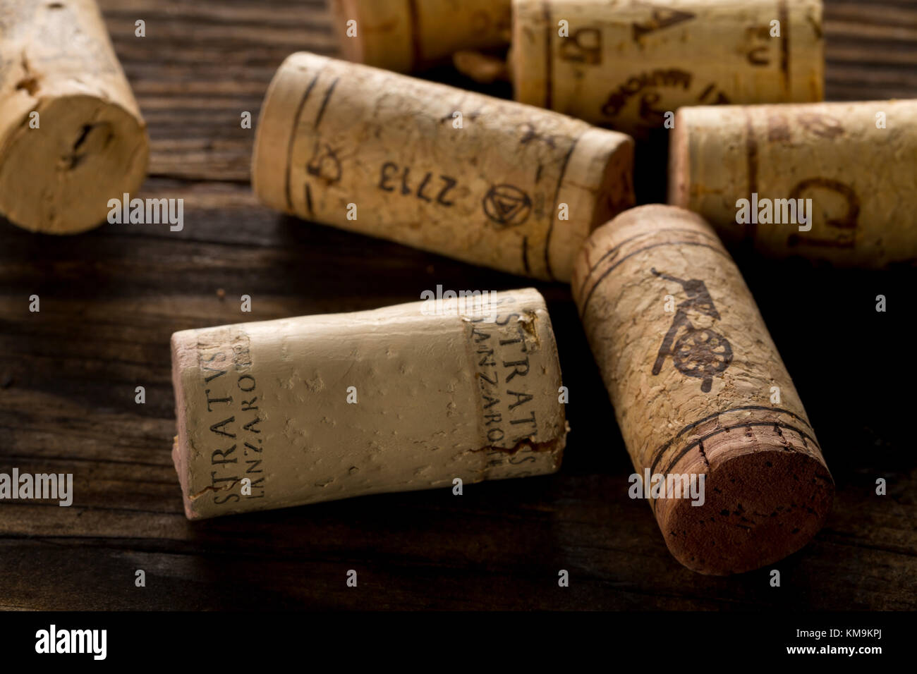 Assorted old, used, wine bottle corks on wooden table Stock Photo - Alamy