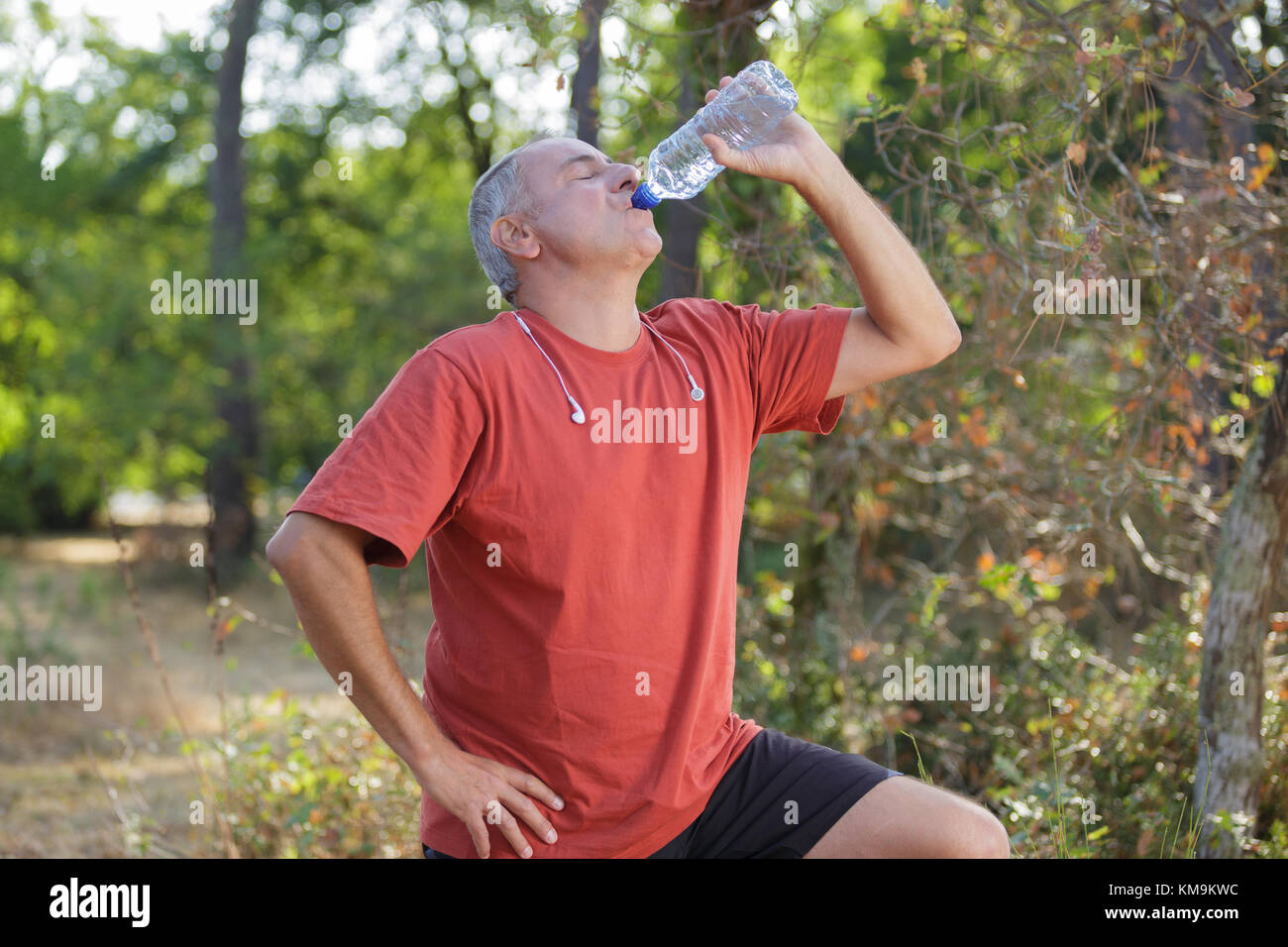 runner drinking water after the race Stock Photo - Alamy