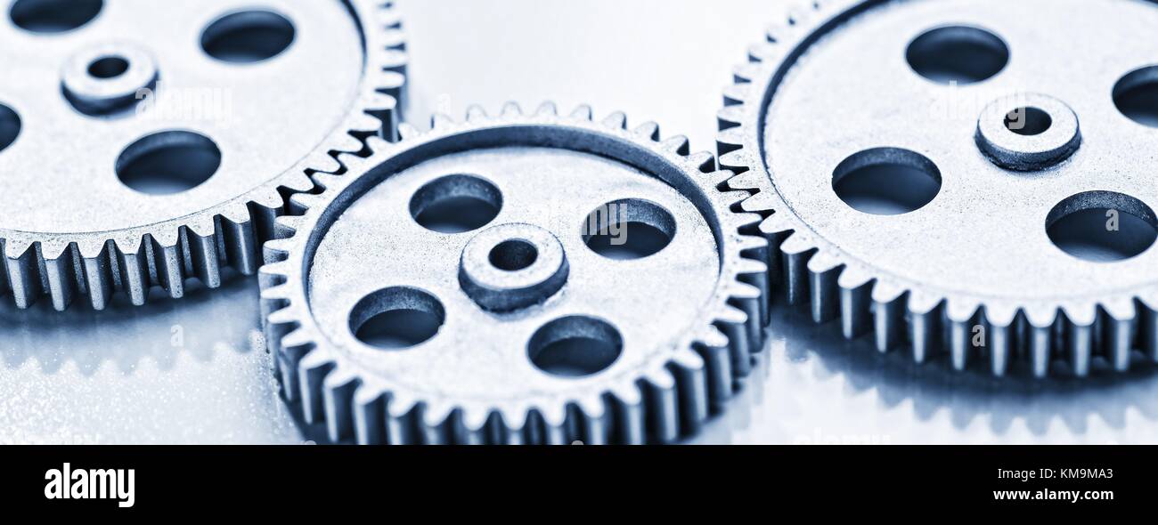 Two large and a small gear wheel which overlap. | usage worldwide Stock ...