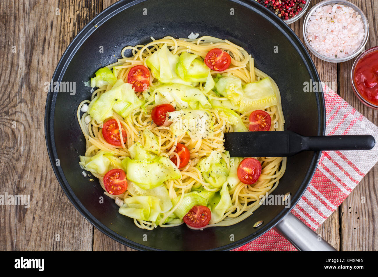 Frying pan wok with spaghetti with vegetables. Studio Photo Stock Photo ...