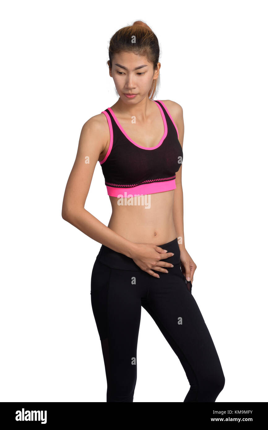 Portrait of fitness woman in black pink sportswear isolated on white ...