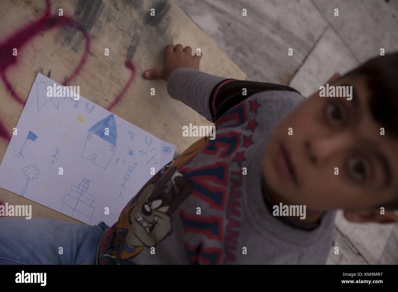 Syrian Refugee Child with his drawing. Refugees in protest since 01 ...