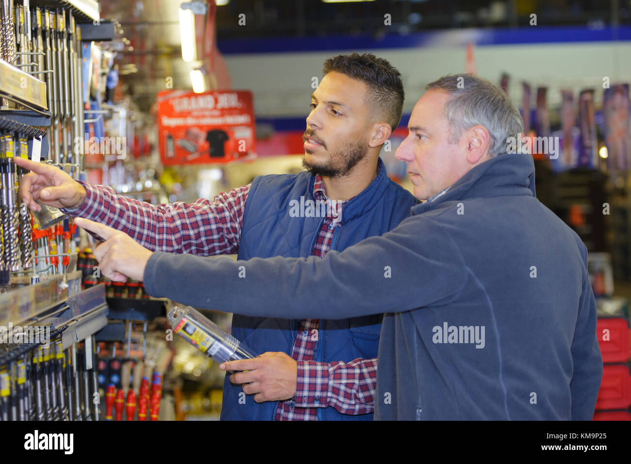 hardwarer store worker and buyer Stock Photo - Alamy