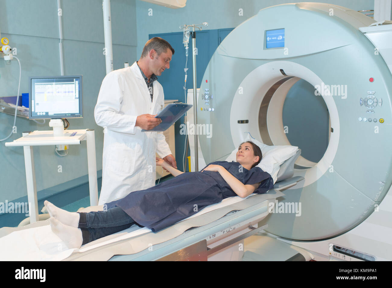 female patient talking to doctor before mri scan Stock Photo - Alamy