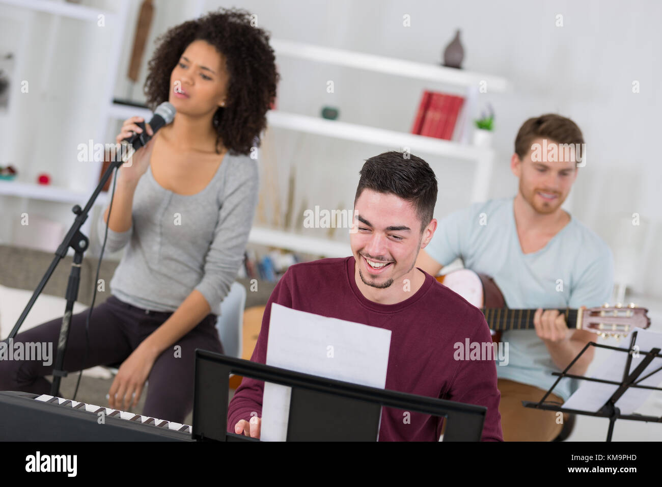 music rock band rehearsal friendship together Stock Photo - Alamy