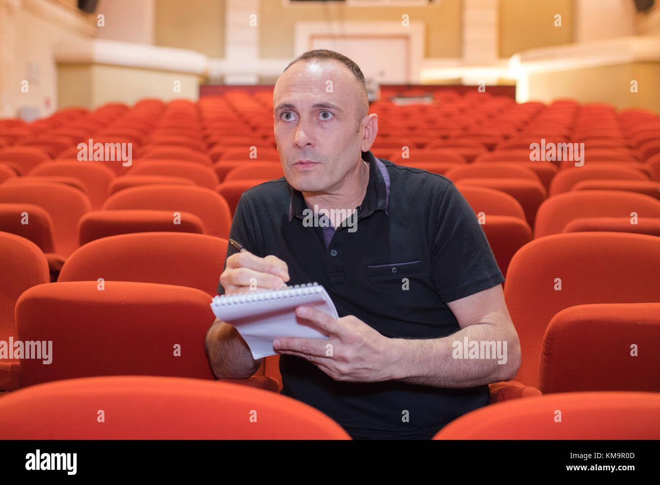 theatre director writing notes notes Stock Photo - Alamy