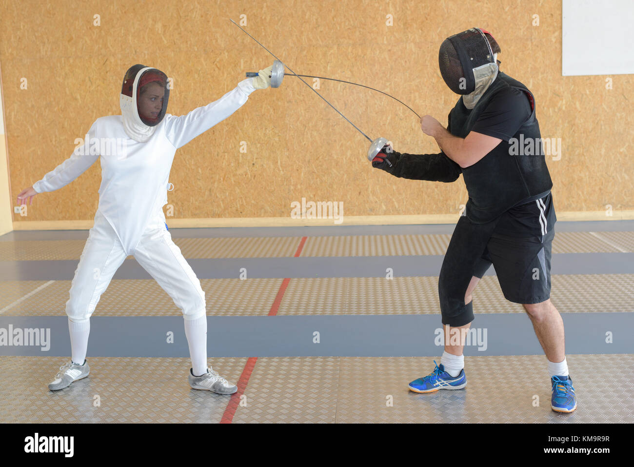 Fencing dual hi-res stock photography and images - Alamy