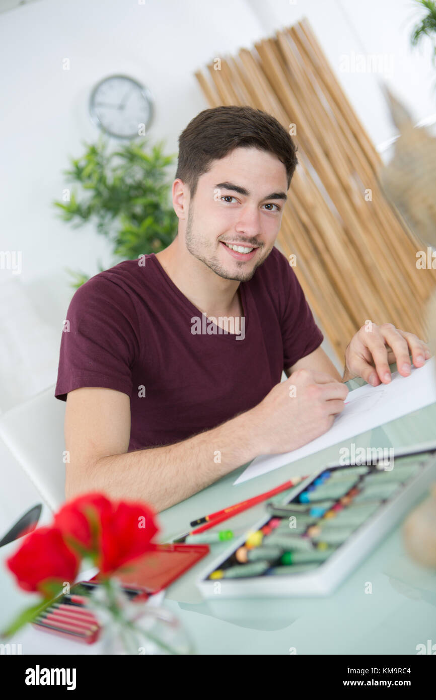 young man working on architectural project Stock Photo - Alamy