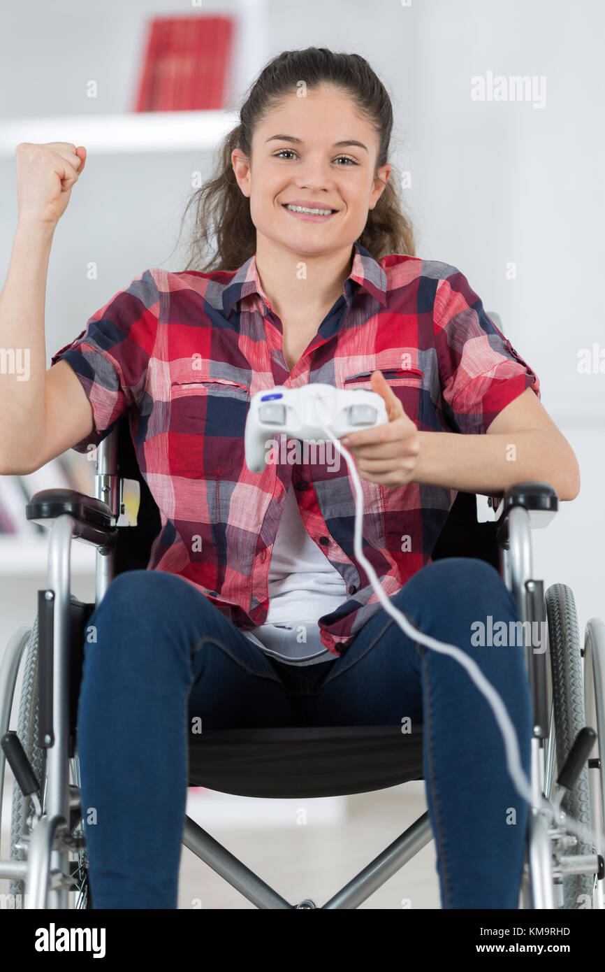 disabled female playing video game Stock Photo - Alamy