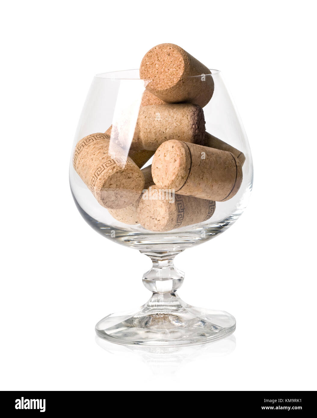 corks in the wine glass isolated on white background Stock Photo - Alamy