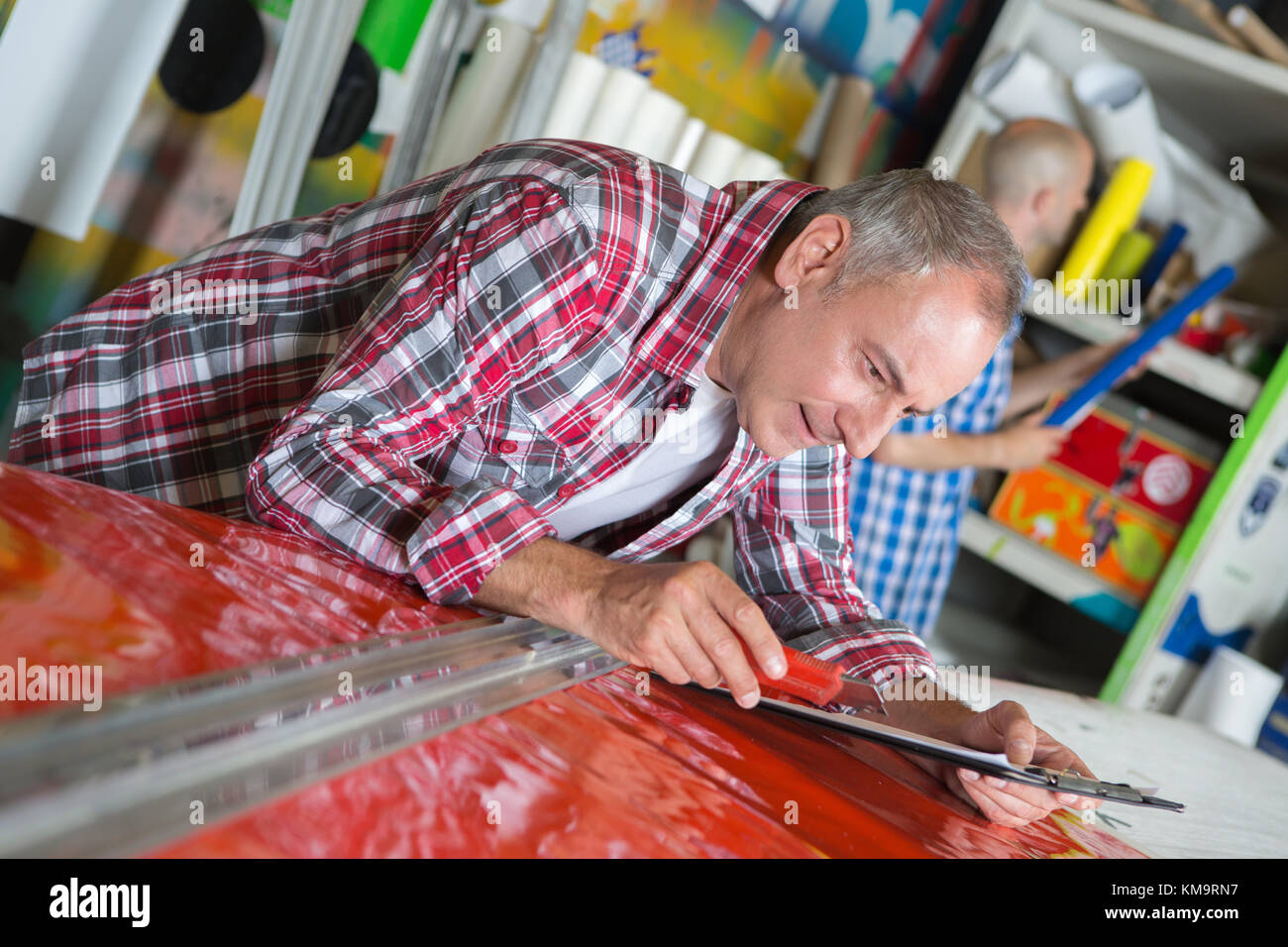 handyman working in home garage Stock Photo - Alamy
