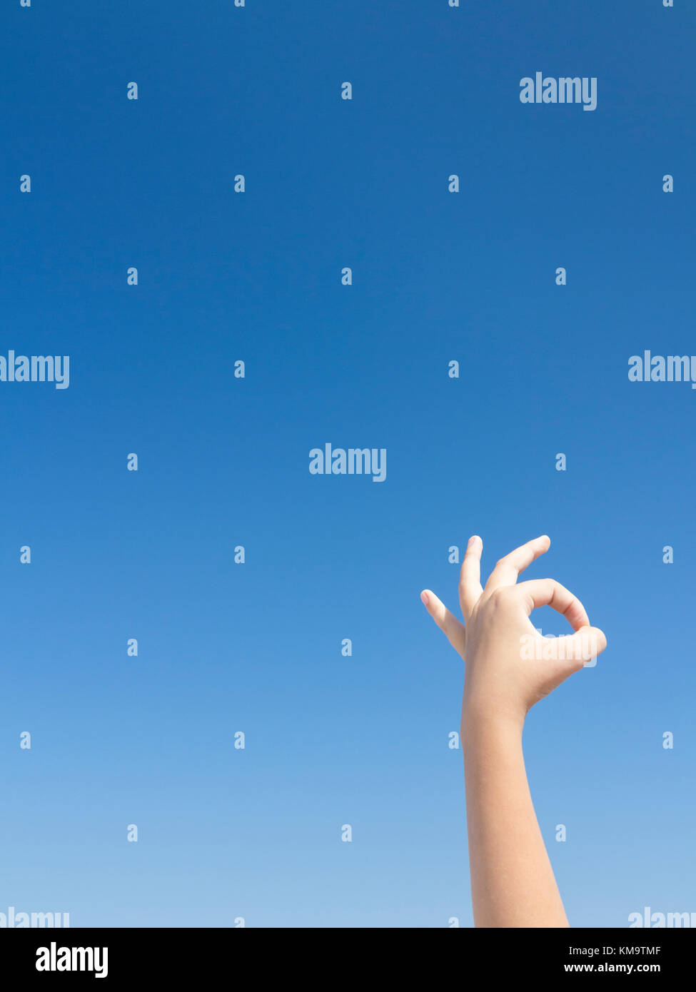 OK sign against a blue sky Stock Photo - Alamy