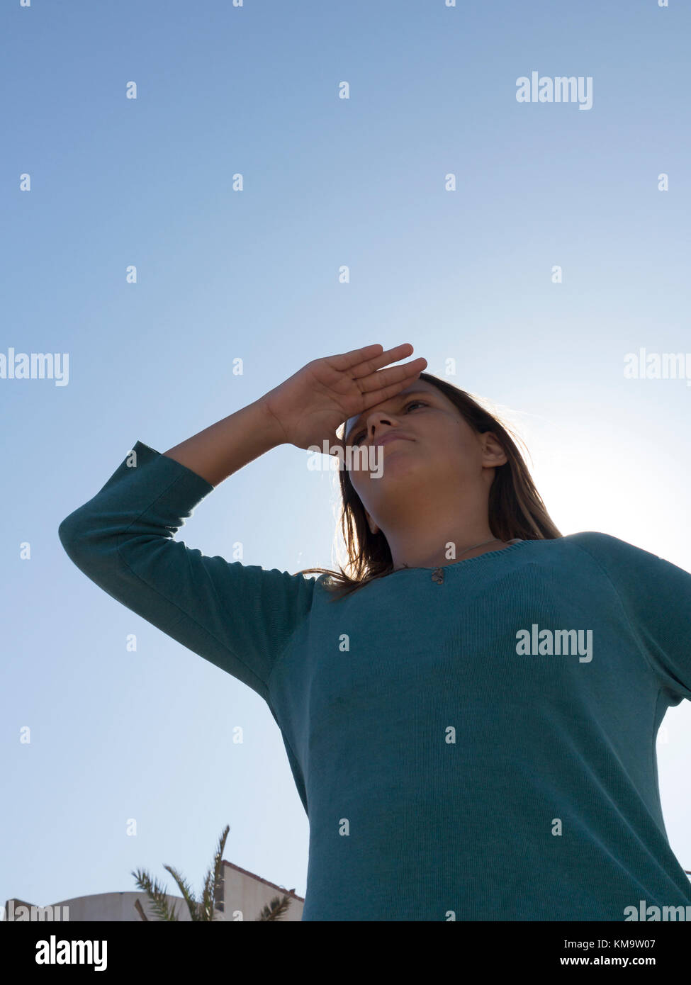 Teenage girl looking out Stock Photo - Alamy