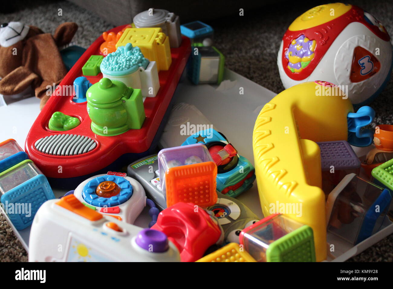 Child cleaning up toys hi-res stock photography and images - Alamy