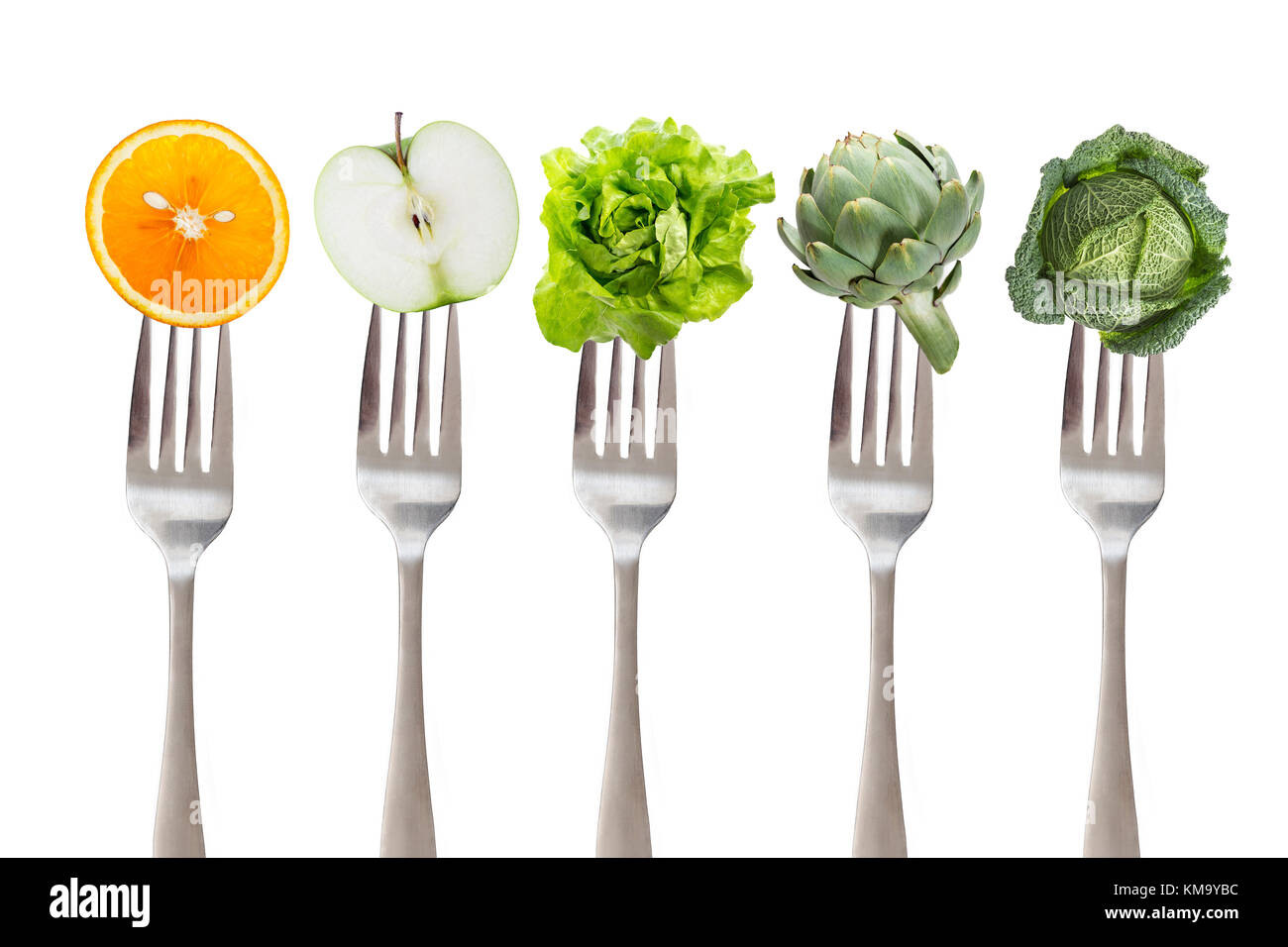 healthy eating: five iron fork with fruit and vegetable, on white ...