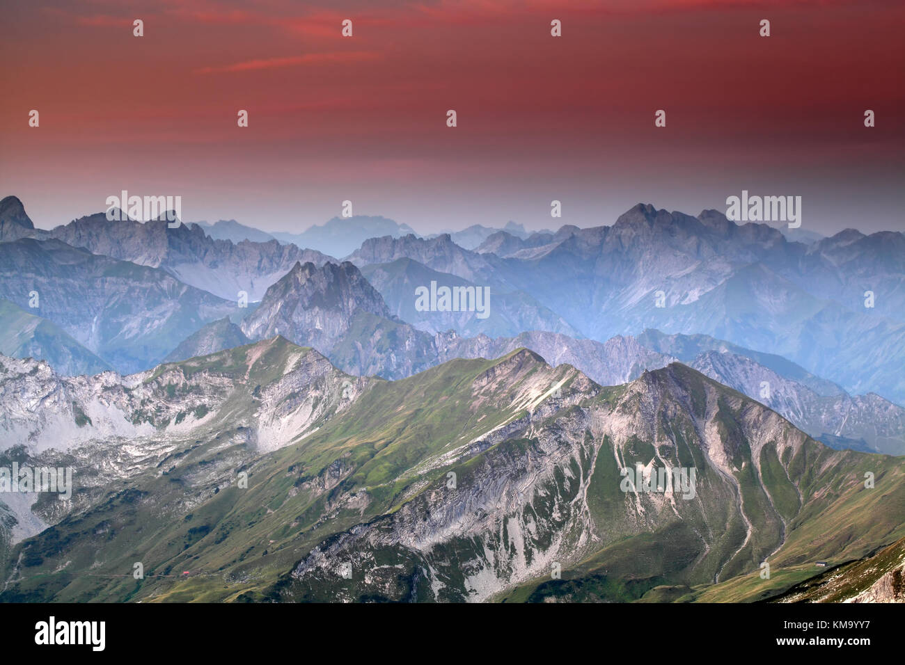 red sunrise over mountain peaks in Alps Stock Photo - Alamy