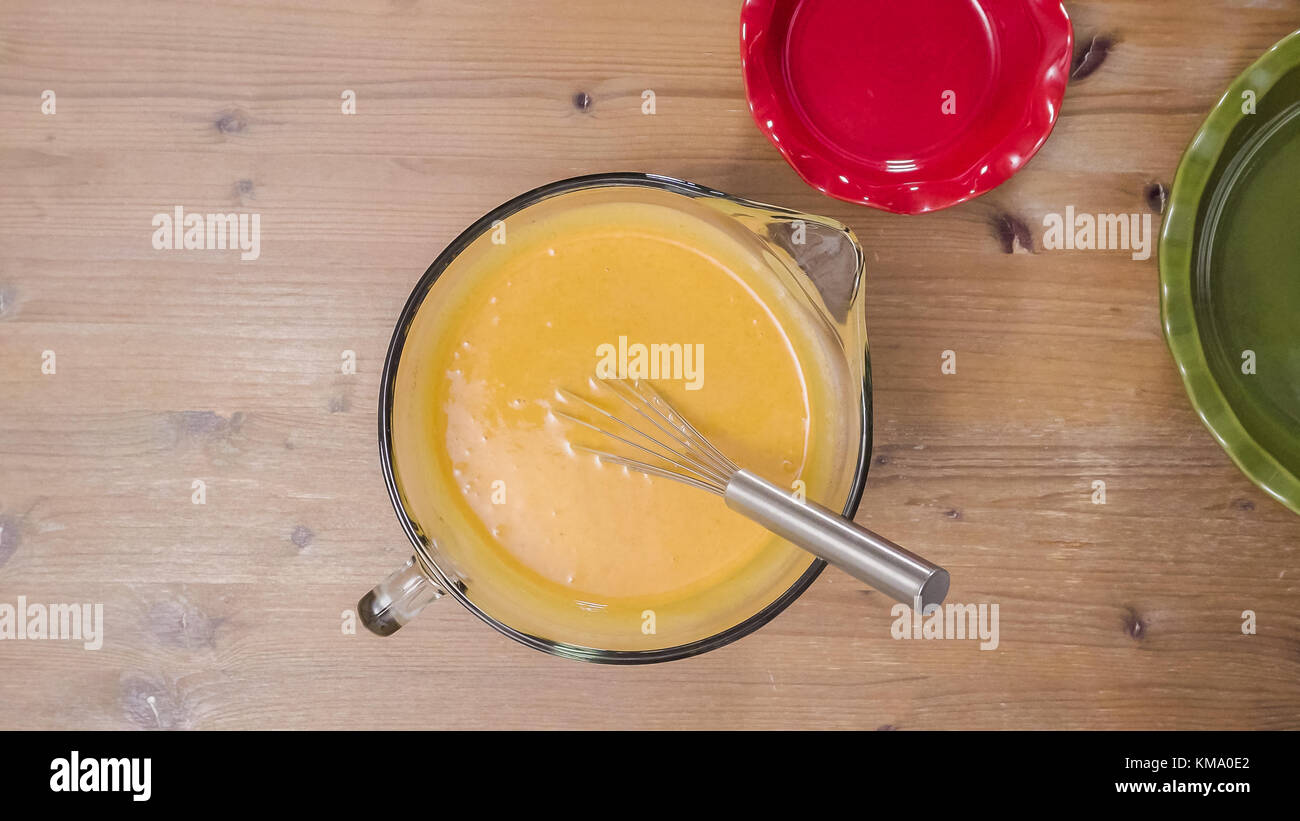 Step by step. Mixing ingredients for pumpkin pie filling Stock Photo ...