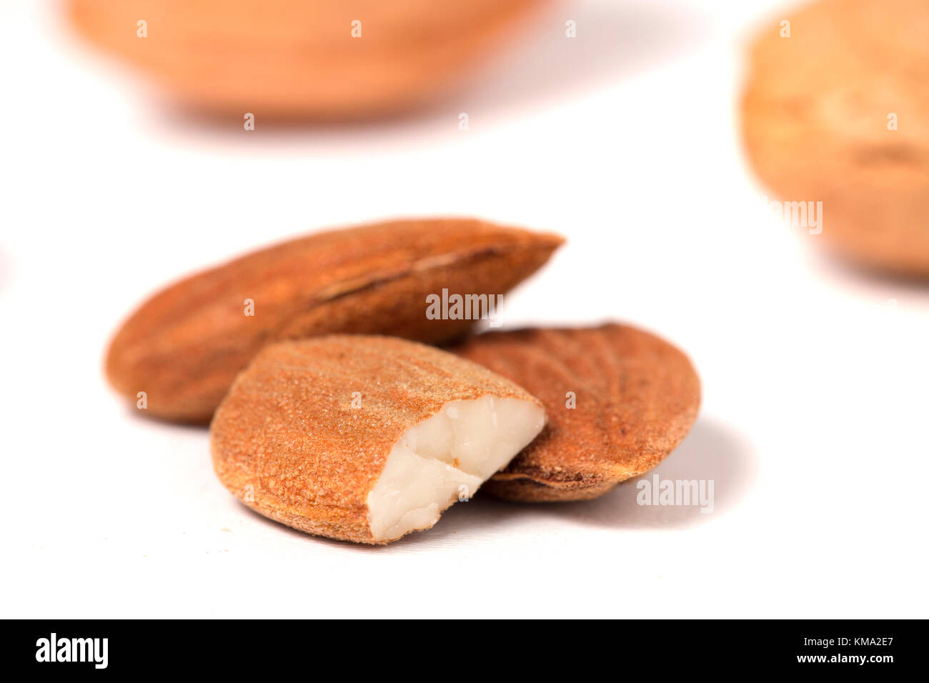 Sweet almond drupes isolated on a white background Stock Photo - Alamy