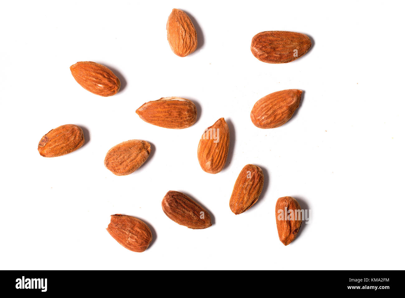 Sweet almond drupes isolated on a white background Stock Photo - Alamy