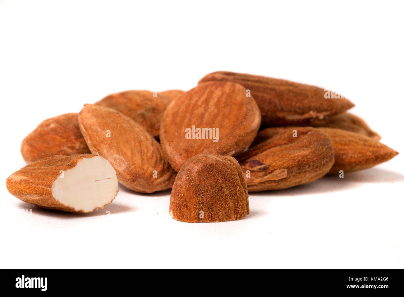 Sweet almond drupes isolated on a white background Stock Photo - Alamy