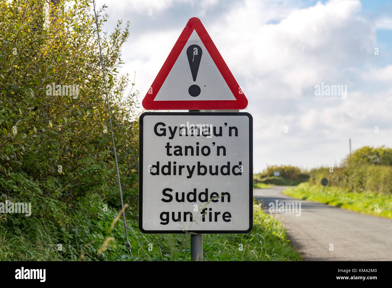 Sign: "Sudden gun fire" (Welsh & English), seen near Castlemartin ...