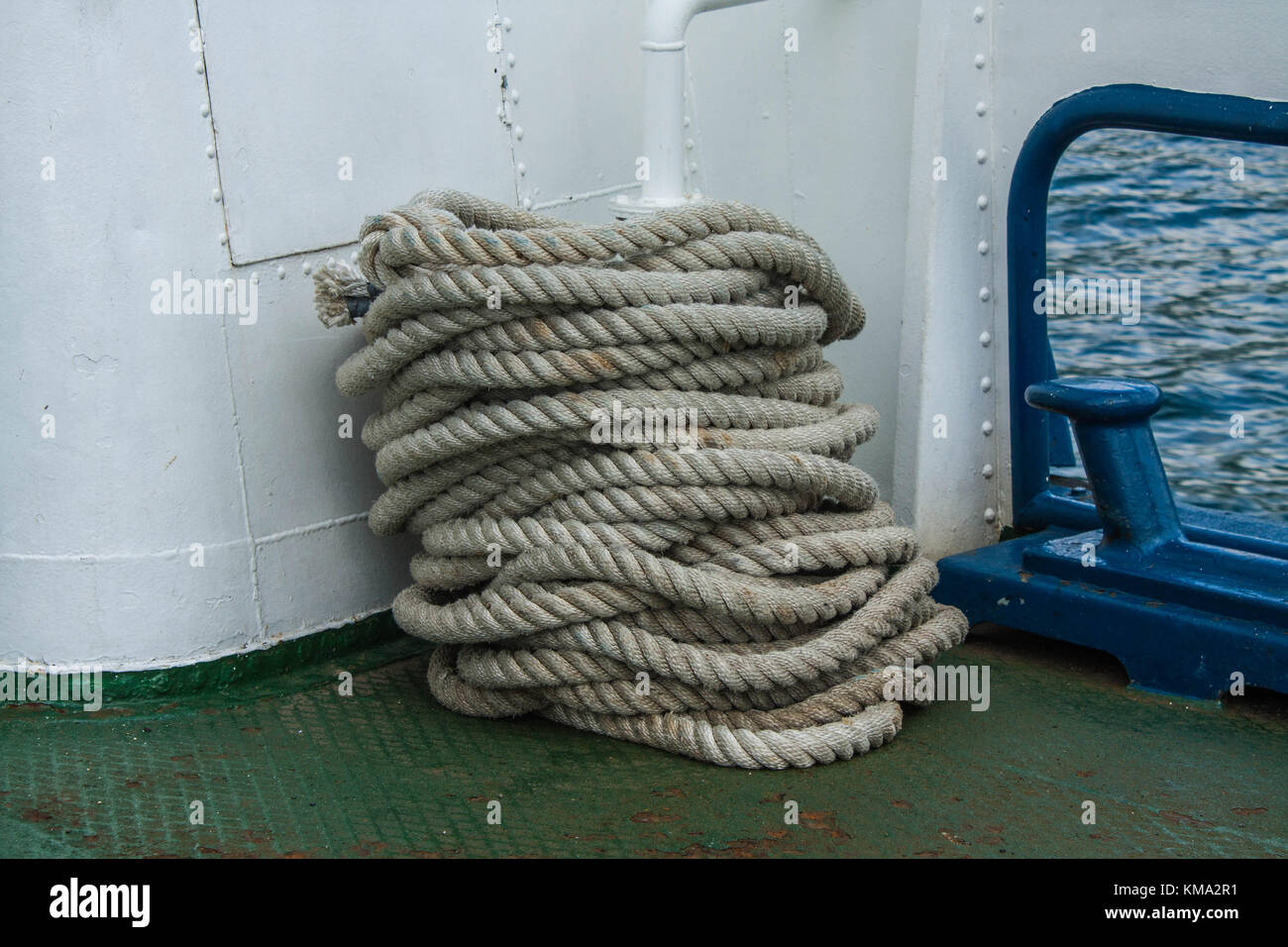 Ship rough rope roll on deck of vessel Stock Photo - Alamy