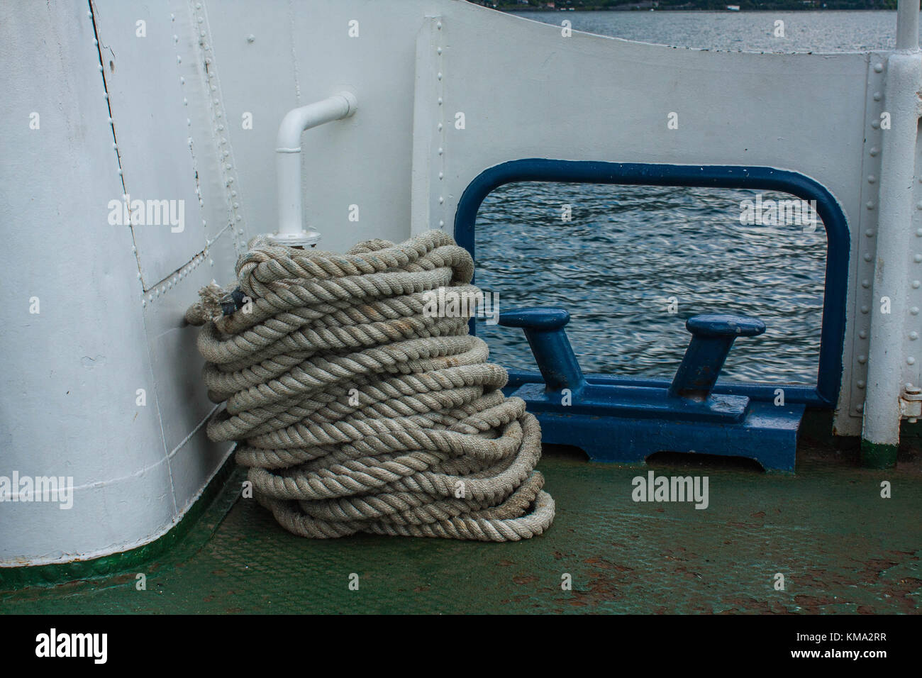 Ship rough rope roll on deck of vessel Stock Photo - Alamy