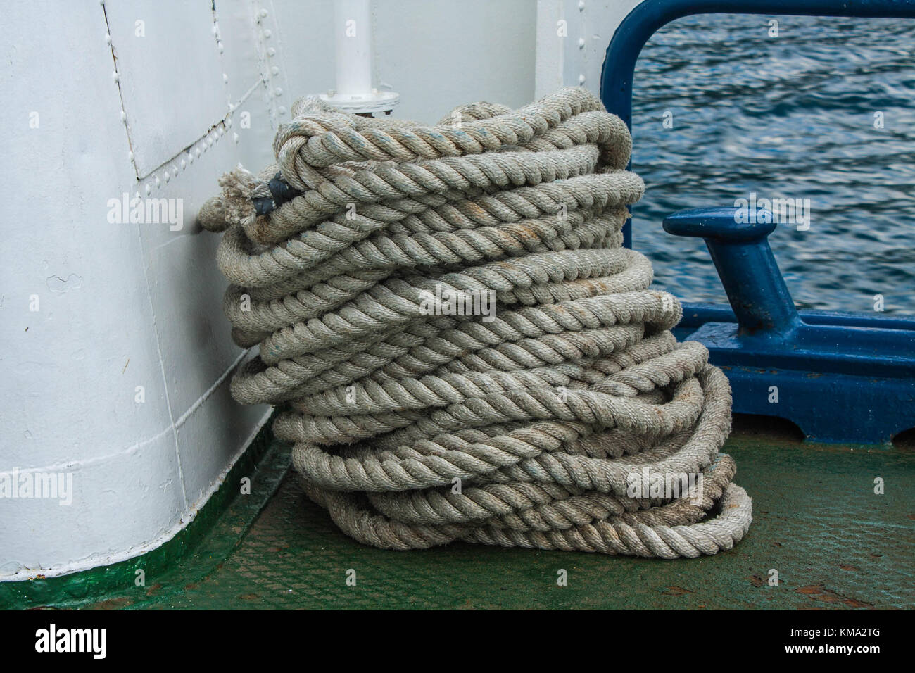 Ship rough rope roll on deck of vessel Stock Photo - Alamy