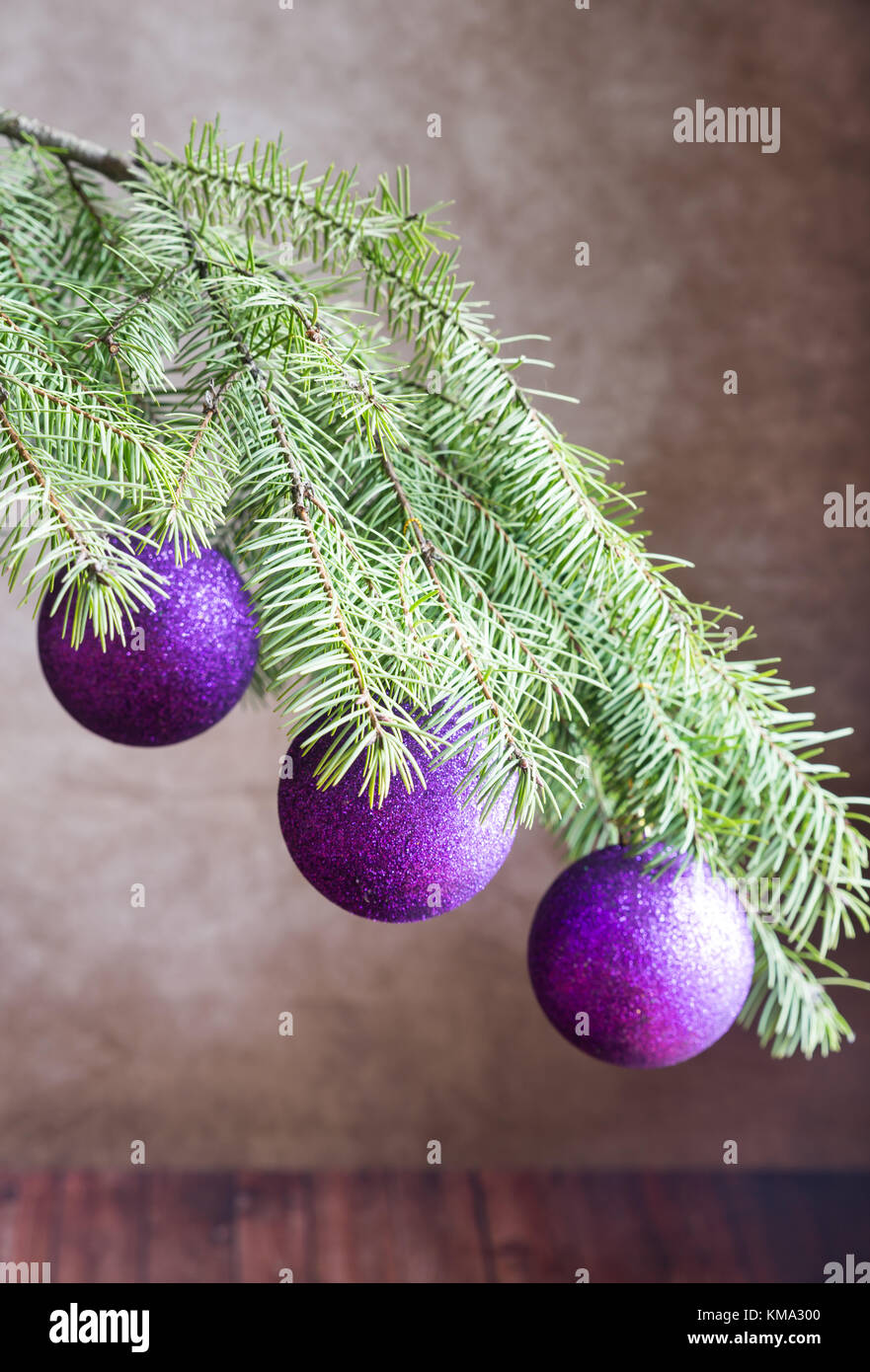 Christmas tree branch with ornaments Stock Photo - Alamy