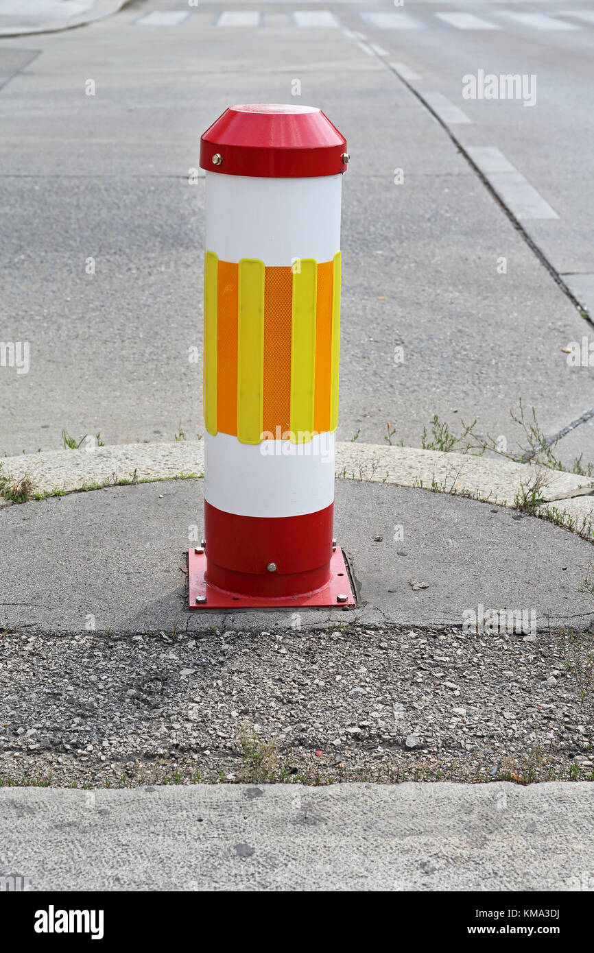 Traffic Column Reflective Sing at Street Island Stock Photo - Alamy