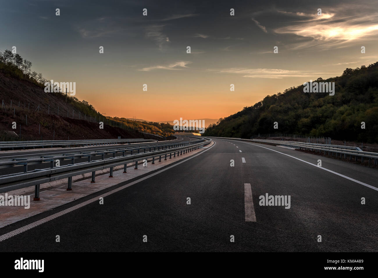Empty Highway road with markings at sunset Stock Photo - Alamy