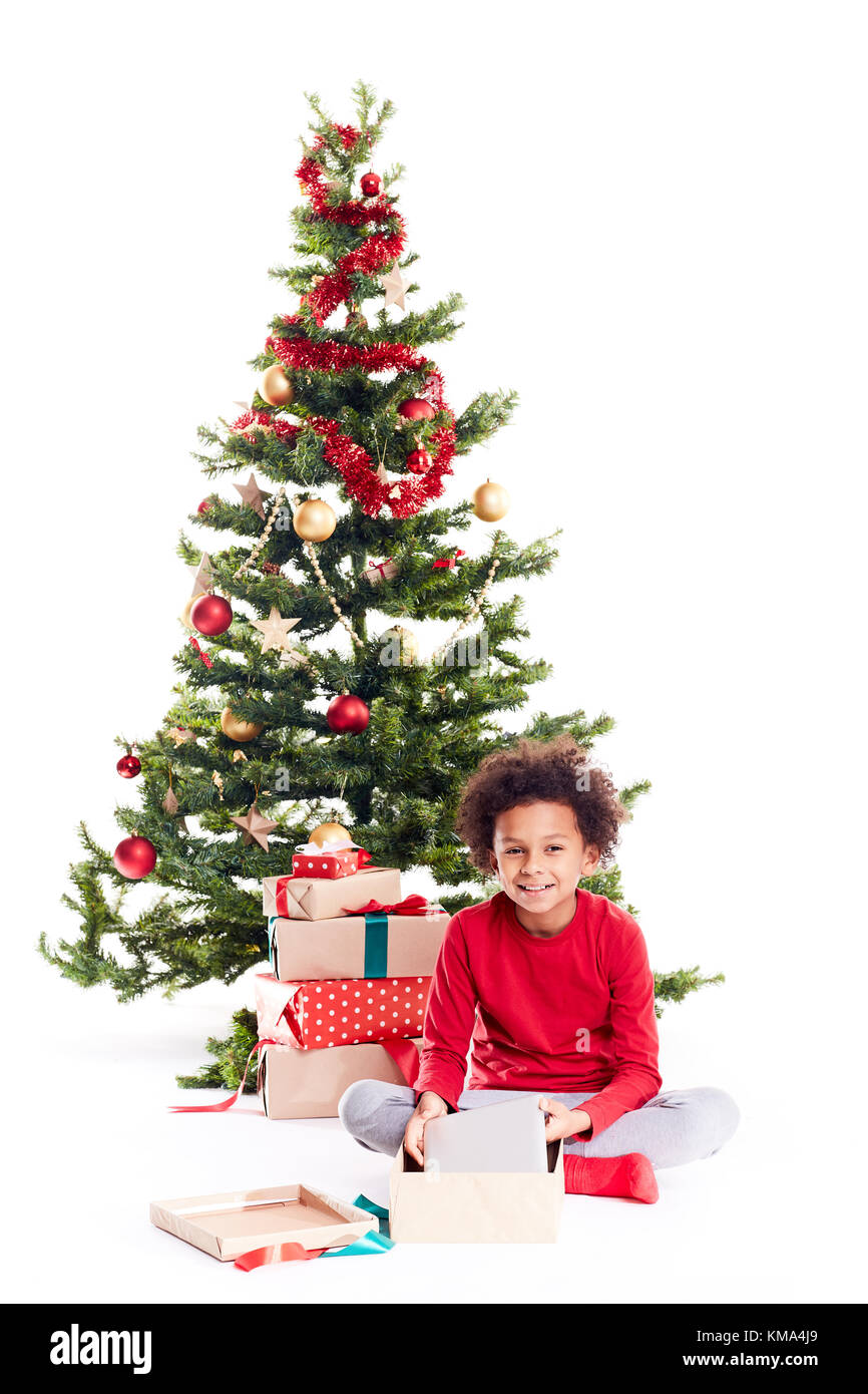 Cute boy christmas gifts Cut Out Stock Images & Pictures - Alamy