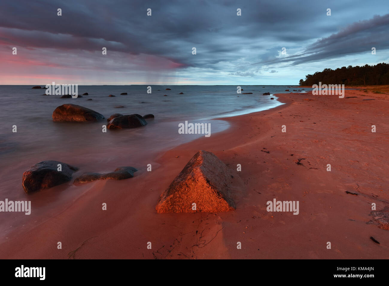 Sunset through the rain, Baltic sea coast at Kõpu peninsula, Hiiumaa ...