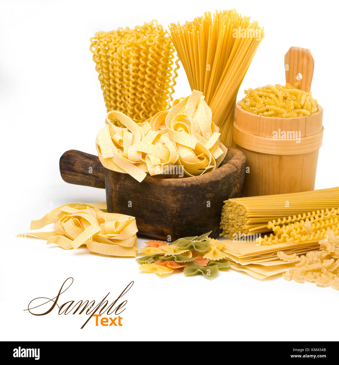 pasta and wooden plate isolated on white background Stock Photo - Alamy